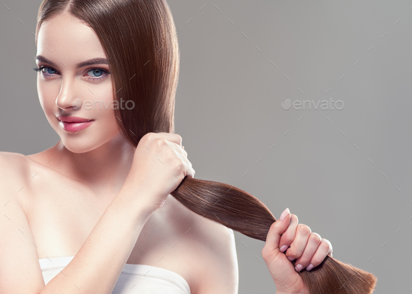 Long hair woman hand touching hair smooth brunette hairstyle model ...