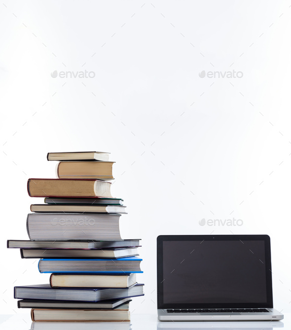 Elearning, books stack and a laptop isolated on white background Stock ...