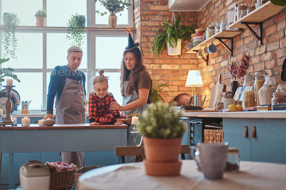One morning of small family at the kitchen Stock Photo by fxquadro