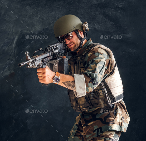 Military guard is holding his machine gun Stock Photo by fxquadro ...