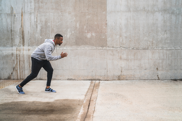 Portrait of an athletic man running. Stock Photo by megostudio | PhotoDune
