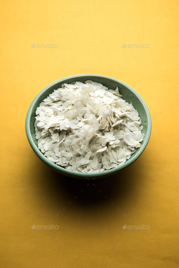 Puffed Rice Poha - Uncooked or Raw, selective focus Stock Photo by ...