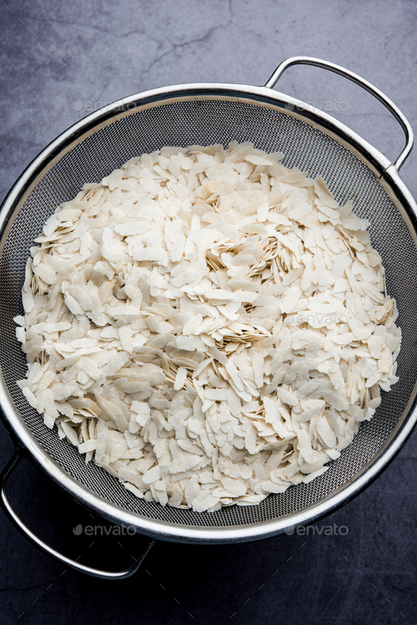 Puffed Rice Poha - Uncooked or Raw, selective focus Stock Photo by ...