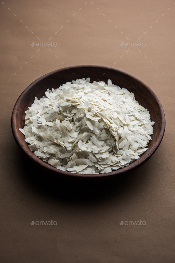 Puffed Rice Poha - Uncooked or Raw, selective focus Stock Photo by ...