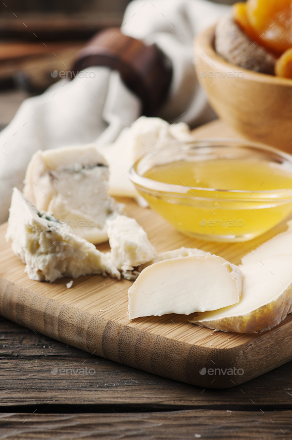 Mix of different cheese with honey Stock Photo by OxanaDenezhkina ...