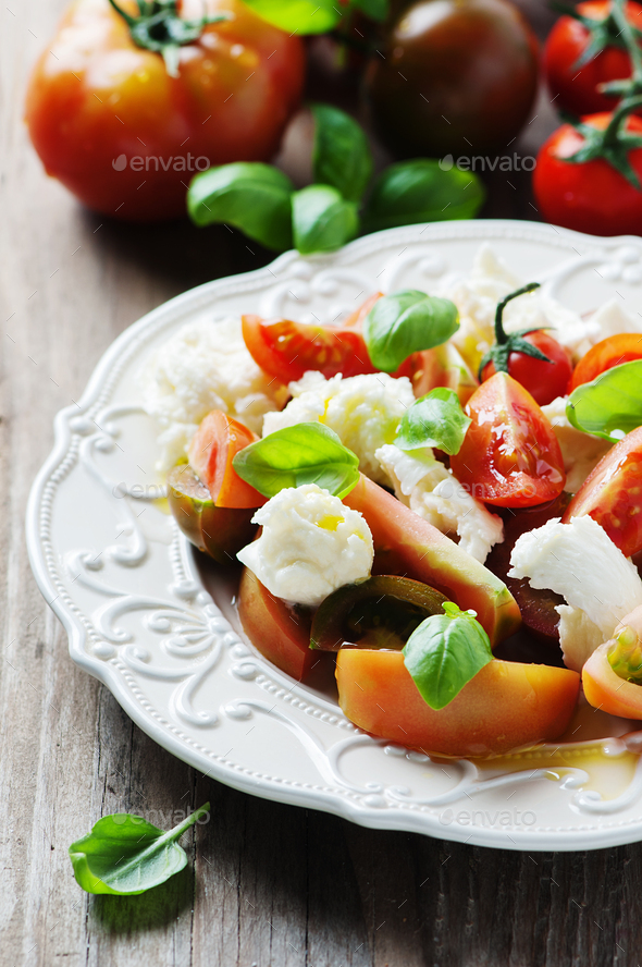 Traditional italian antipasto caprese with mozzarella Stock Photo by ...