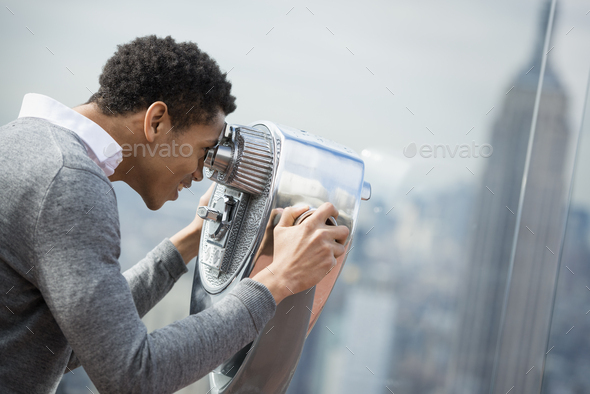An observation deck overlooking the Empire State Building. A man ...