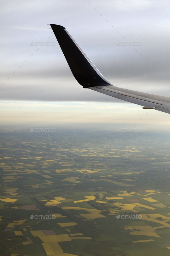 The winglet or wing tip of an aircraft viewed from the passenger window ...