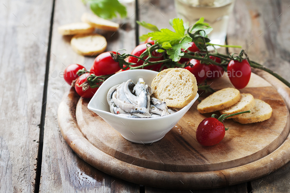 Italian traditional anchovy with bread and tomato Stock Photo by ...