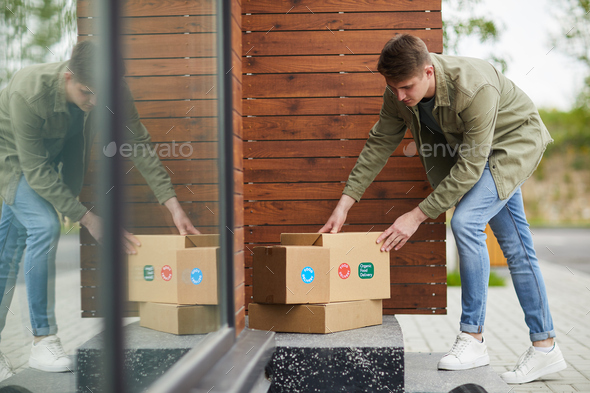 Man getting his parcels Stock Photo by AnnaStills | PhotoDune