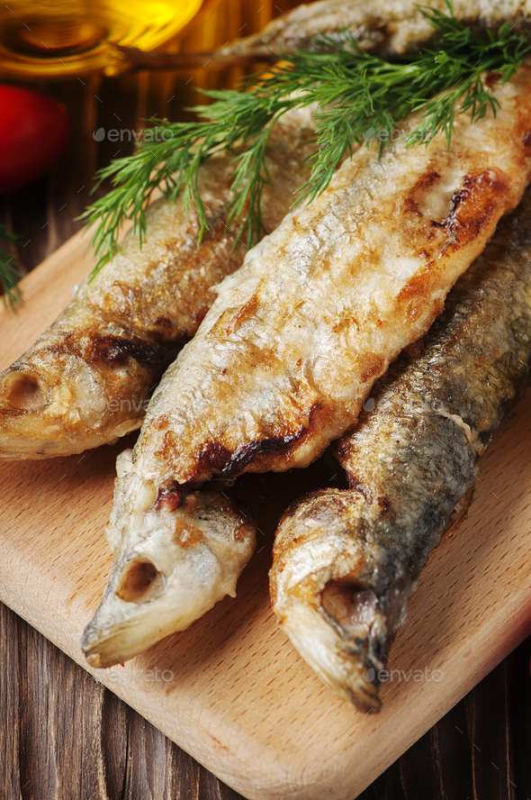Traditional russian cooked fish smelt Stock Photo by OxanaDenezhkina