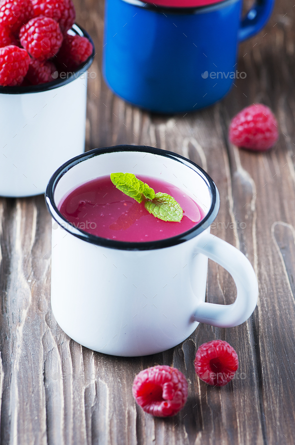 Russian kissel with raspberry and mint Stock Photo by OxanaDenezhkina