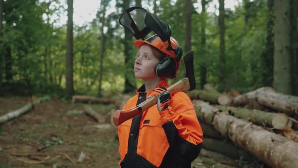 Portrait of a Female Logger Standing in the Forest a Young Specialist ...