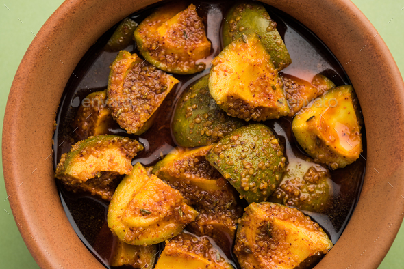 Indian Homemade Raw Mango Pickle or aam ka achar or Kairi Loncha in a ...