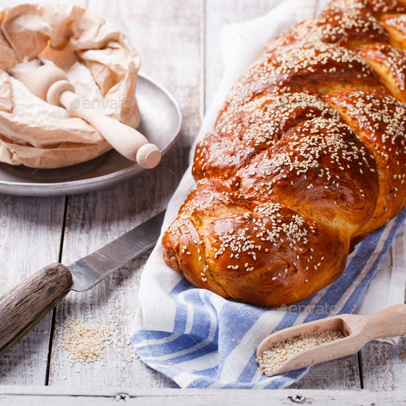 Challah bread with sesame seeds. Pastry.Bread Stock Photo by prosto_juli