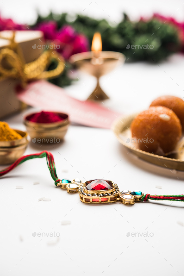Indian festival Raksha Bandhan with rakhi bracelets, presents, rice and ...