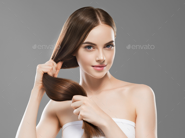Long hair woman hand touching hair smooth brunette hairstyle model ...