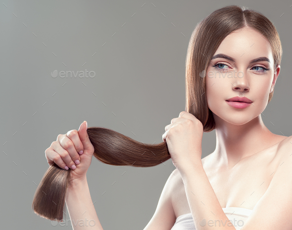 Long hair woman hand touching hair smooth brunette hairstyle model ...