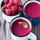 Russian kissel with raspberry and mint Stock Photo by OxanaDenezhkina