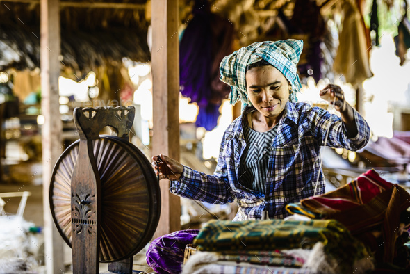 55055,Asian woman spinning thread Stock Photo by Mint_Images | PhotoDune