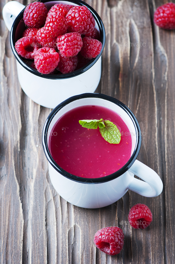 Russian kissel with raspberry and mint Stock Photo by OxanaDenezhkina