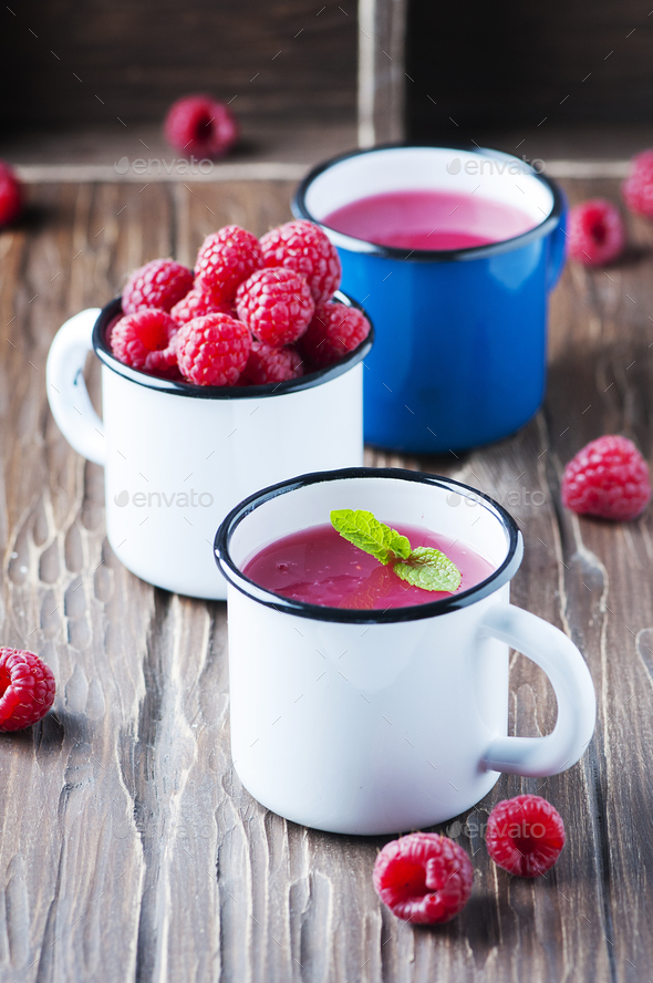 Russian kissel with raspberry and mint Stock Photo by OxanaDenezhkina