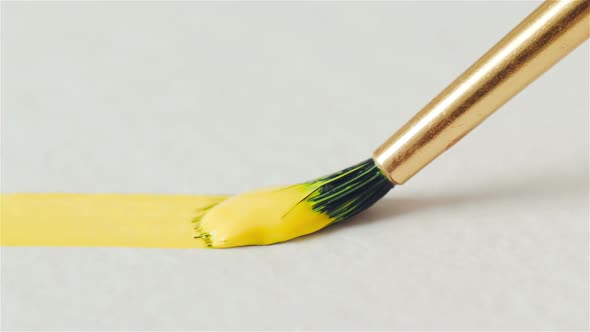 Artist Painting With Paint Brush On A Paper With Macro Details by Libray