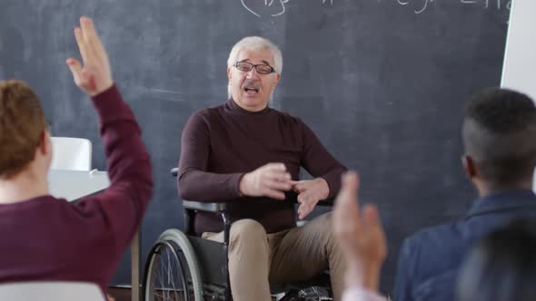 Professor Asking Questions to Students in Class, Stock Footage | VideoHive