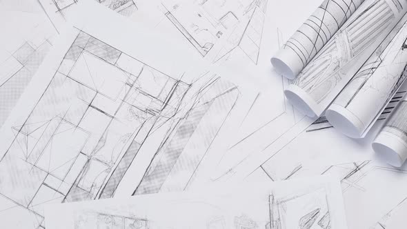 Background with architectural drawings. Sheets with sketches of ...