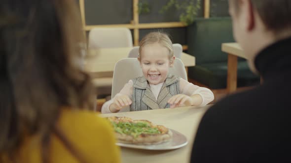 Cheerful Charming Little Girl Clapping As Waiter Bringing Pizza in ...