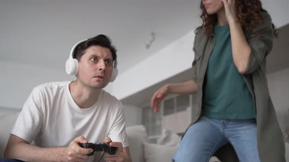 Wife and Husband Argue and Fight Over Man Playing Games, Stock Footage