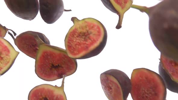 Closeup of the Fresh Delicious Sweet Fig Fruit Halves Falling ...
