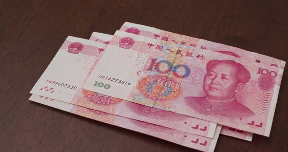 Counting chinese RMB banknote on the table, Stock Footage | VideoHive
