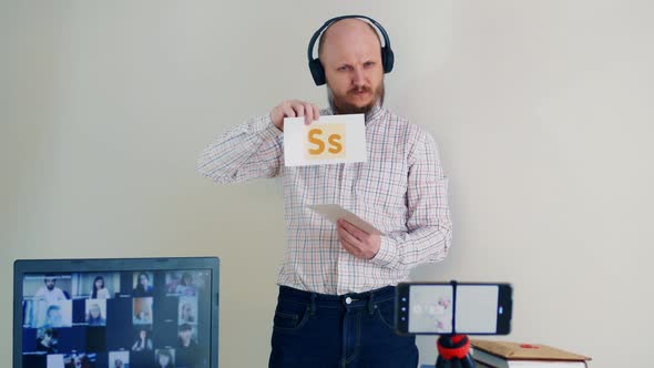 A Bald Man with a Beard Conducts Training Online the Study of Alphabet ...