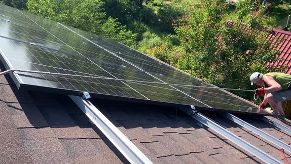 Installation Site of PV Solar Panels on Bituminous Tiles Roof of Small ...