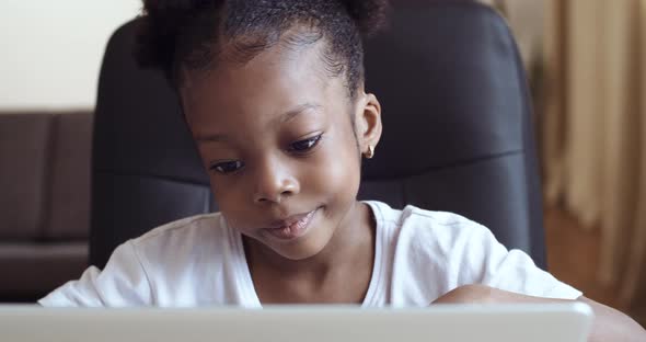 Front View of Little Upset Sad Girl African American Child Sitting at ...