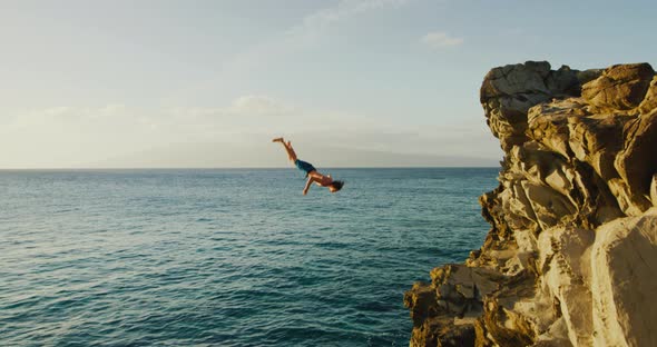 Backflip Cliff Jumping into the Ocean, Stock Footage | VideoHive