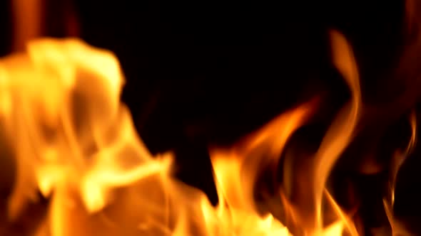 Orange and Yellow Fire Flame Burning Against Black Background. Abstract ...