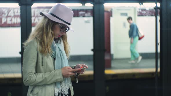 Using Mobile Phone At Metro Station, Stock Footage | VideoHive
