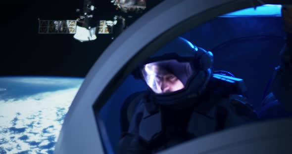Astronaut Looking Out of Spaceship Window, Stock Footage | VideoHive