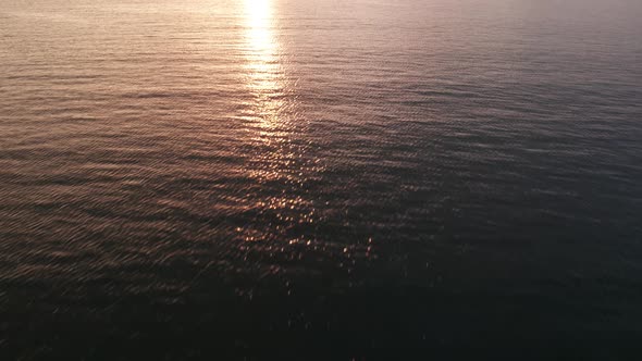 Fly over ocean, sea on sunrise. Close to the water, Stock Footage ...