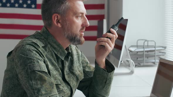 Army Officer Talking on Walkie-Talkie in Office, Stock Footage | VideoHive