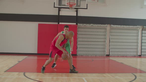 Basketball Player Guarding His Opponent During Game, Stock Footage