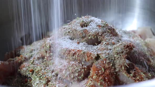 Sprinkling Iodized Salt On Chicken Breast With Herbs. - close up, Stock ...