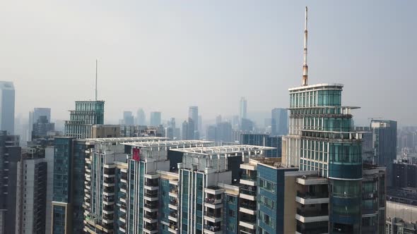 Guangzhou, China. Aerial revealing shot of congested building blocks ...