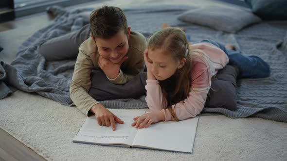 Smart Siblings Reading Book at Home. Brother and Sister Gaining New ...