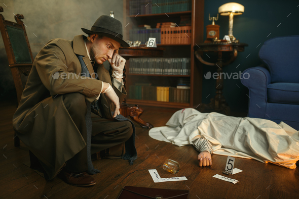 Male detective in gloves thinks at the crime scene Stock Photo by ...