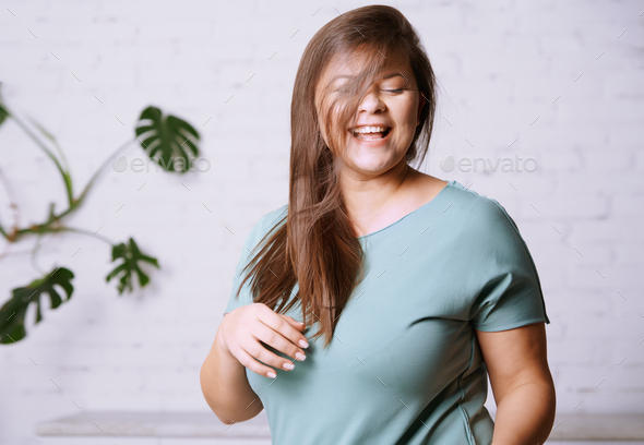 Portrait of the happy plus size model Stock Photo by Zhenikeyev | PhotoDune