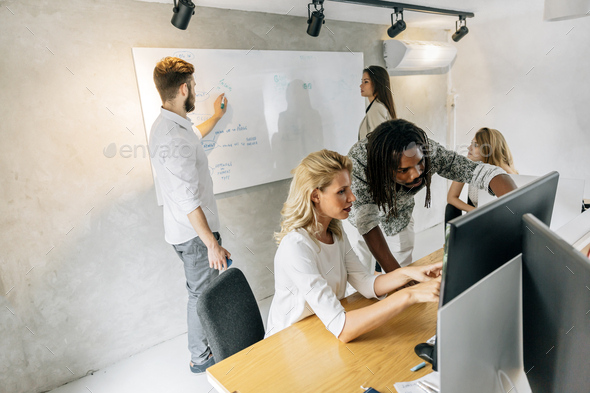 Man pointing at screen of desktop Stock Photo by nd3000 | PhotoDune