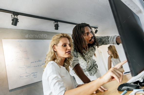 Man pointing at screen of desktop Stock Photo by nd3000 | PhotoDune